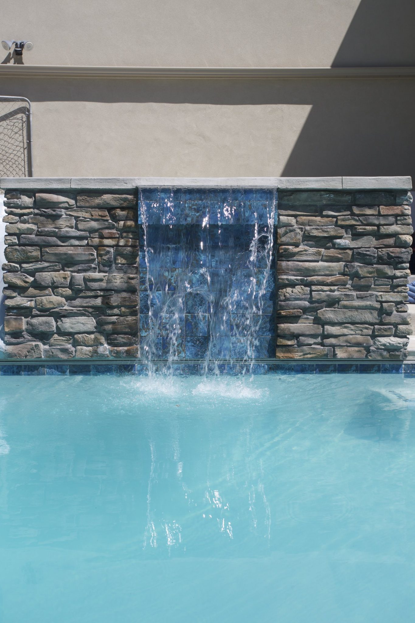 In-ground Swimming Pool With Waterfall Feature and Spa In Hurricane, Ut