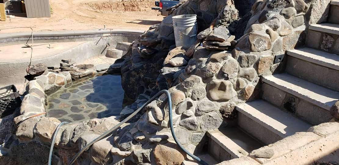 Create A Beautiful Natural Stone Water Feature For Your Swimming Pool