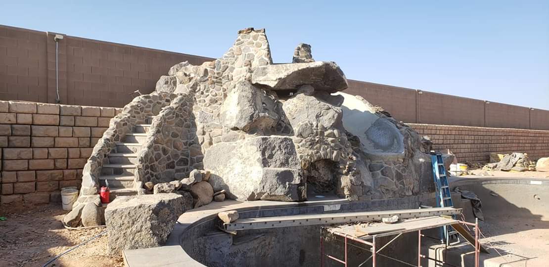 Create A Beautiful Natural Stone Water Feature For Your Swimming Pool
